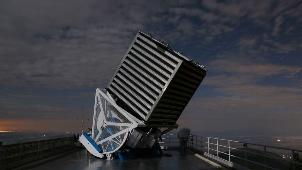 An arc of galaxies 3 billion light-years long may challenge cosmology